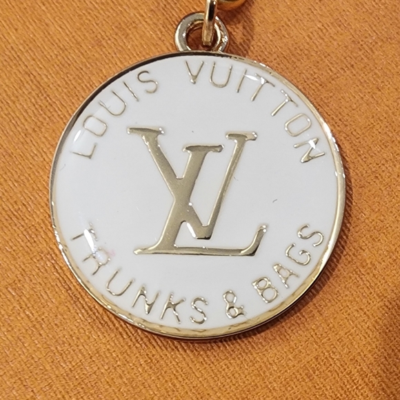 Louis Vuitton | Jewelry | Authentic Lv White And Gold Metal Bag ...